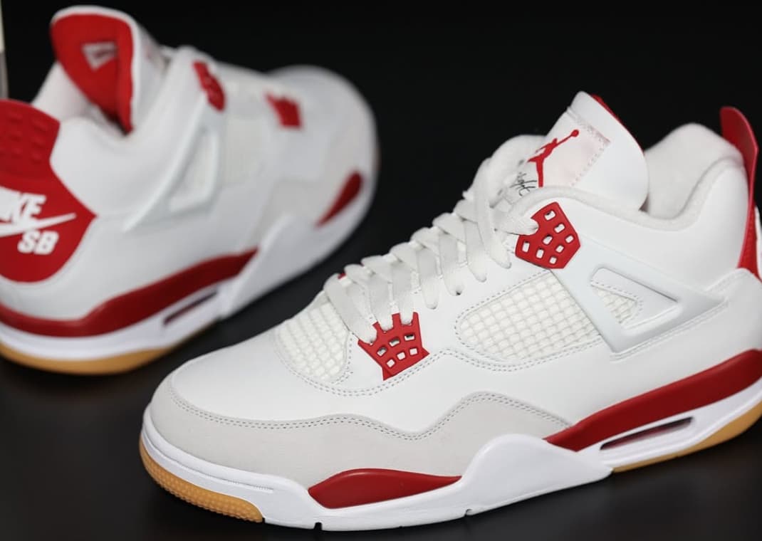 The Nike SB x Air Jordan 4 Summit White Varsity Red is a The Nike SB x Air Jordan 4 Summit White Varsity Red is a