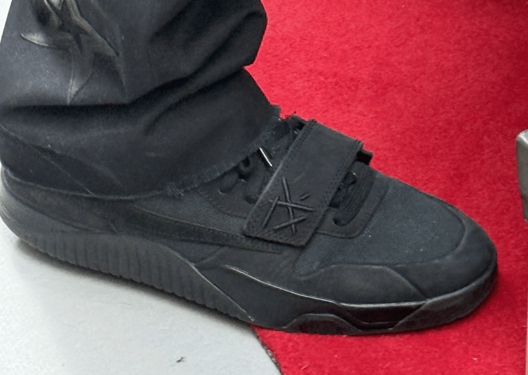 Travis Scott Steps Out in a Triple Black Jordan Jumpman Jack at Virgil ...