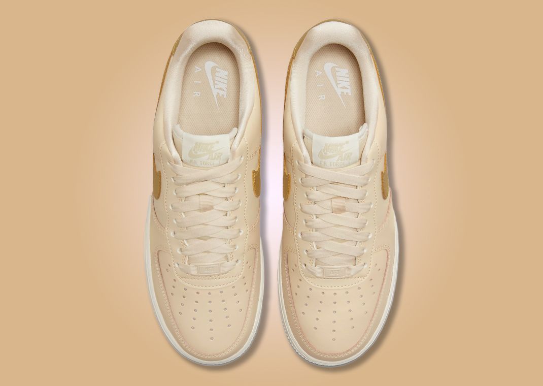 Luxe Metallic Gold Swooshes Adorn The Nike Air Force 1 Low Luxe Metallic Gold Swooshes Adorn The Nike Air Force 1 Low