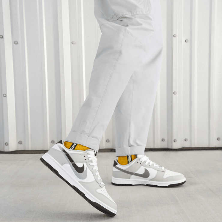 Nike Dunk Low Spray Paint Swoosh - FD0661-100 Release Info